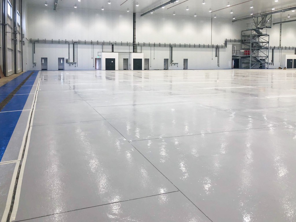 Wheels up for SKYDROL resistant flooring, vebrores EP HBC HCR, at Cranfield Airport - Vebro Polymers